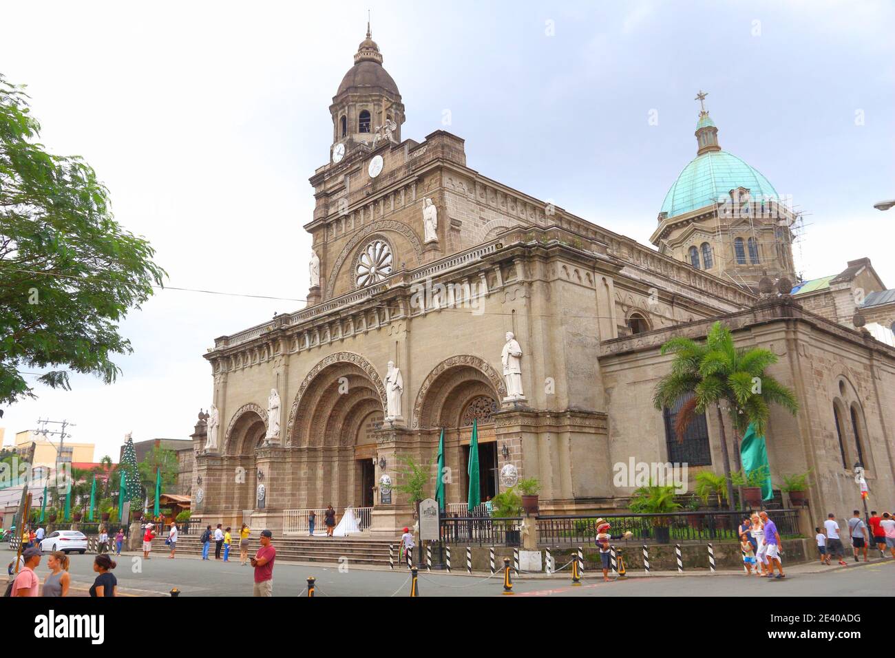 MANILA, PHILIPPINES - NOVEMBER 25, 2017: People visit the Cathedral of ...