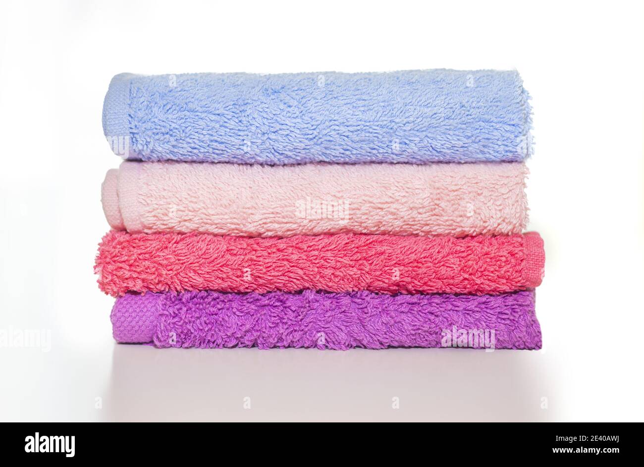 Clean towel set on a white surface - laundry, cleaning Stock Photo - Alamy