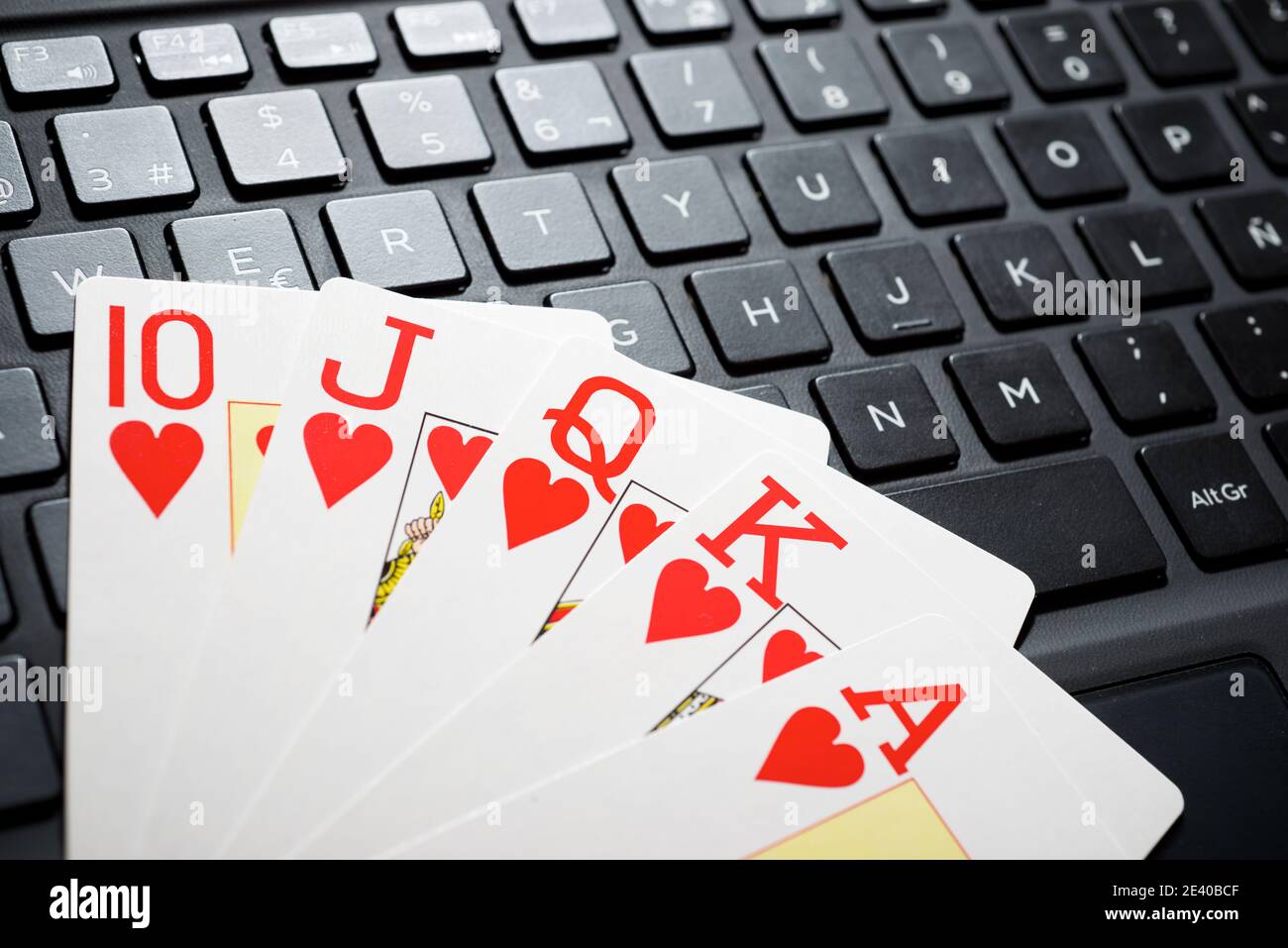 Cards stacking on a laptop Stock Photo - Alamy