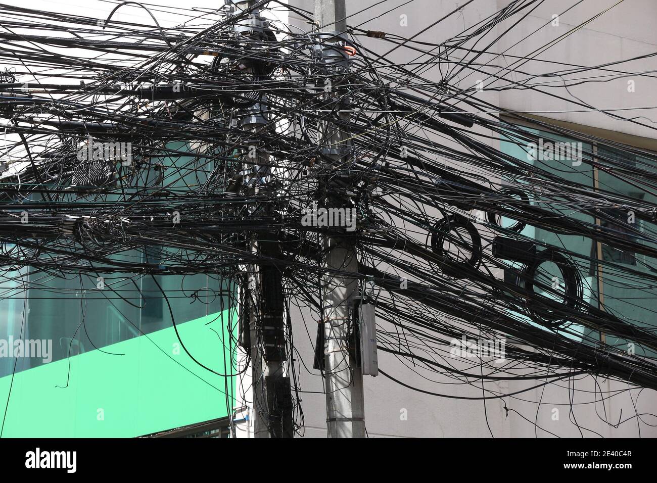 City cable mess in Asia - tangled mess of cables in Manila, Philippines ...