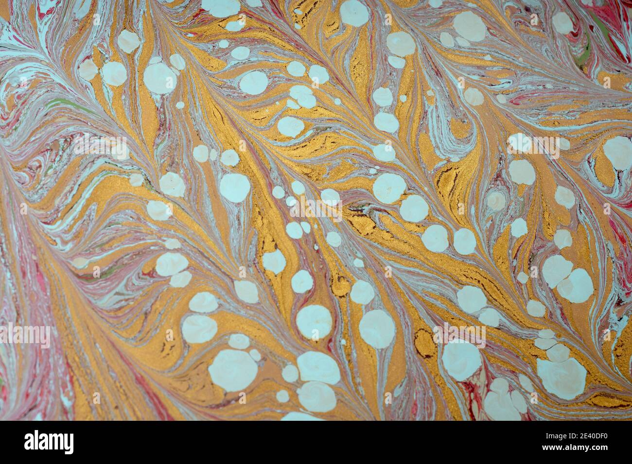 Texture of paper marbling design pattern in dark yellow and light ...