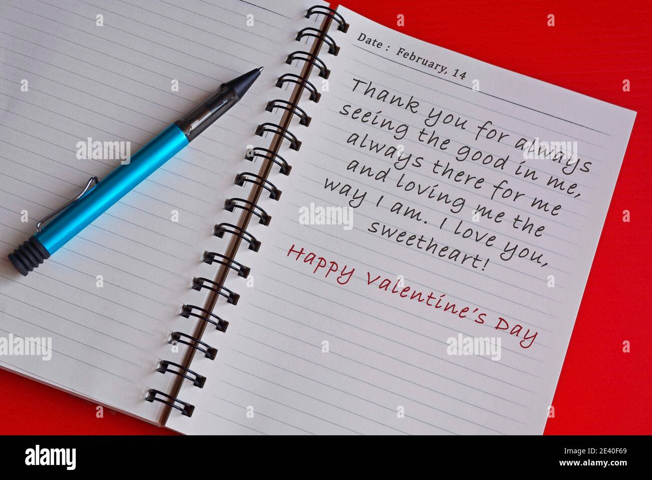 Text on white notepad with red background. Valentine's day concept ...