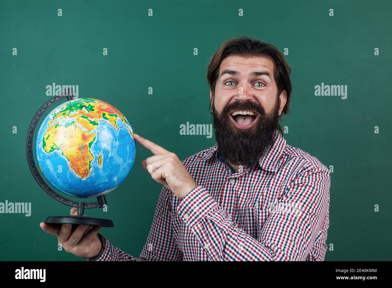 Teacher pointing map hi-res stock photography and images - Alamy