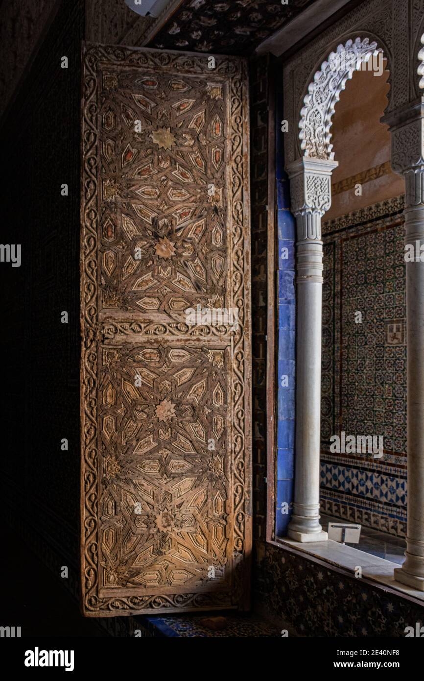 Vertical shot of an entrance arch and columns in a building with ...