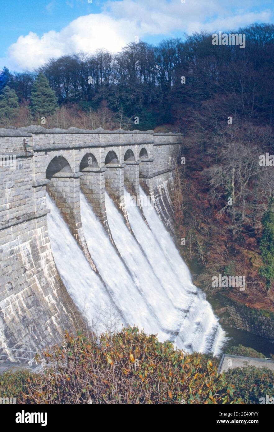1985 Burrator Dam Burrator reservoir wall with water overflowing the ...