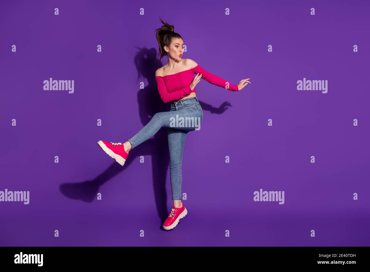 Full length body size view of lovely coquettish cheery girl having fun ...