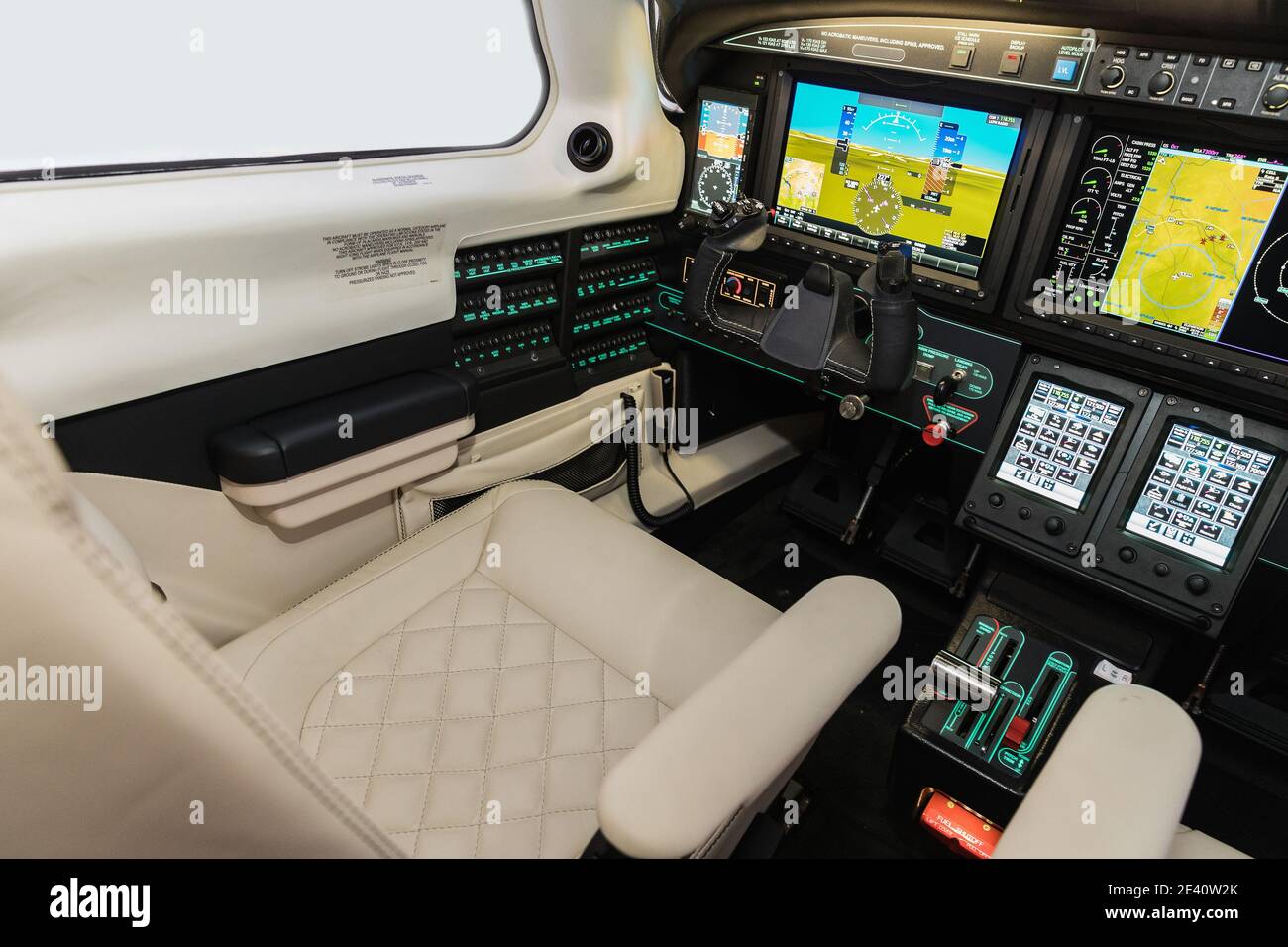 View into the cockpit of a sports plane. Modern Glass cockpit of a ...