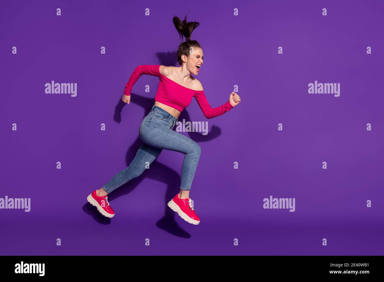 Full length body size view of attractive crazy purposeful girl jumping ...