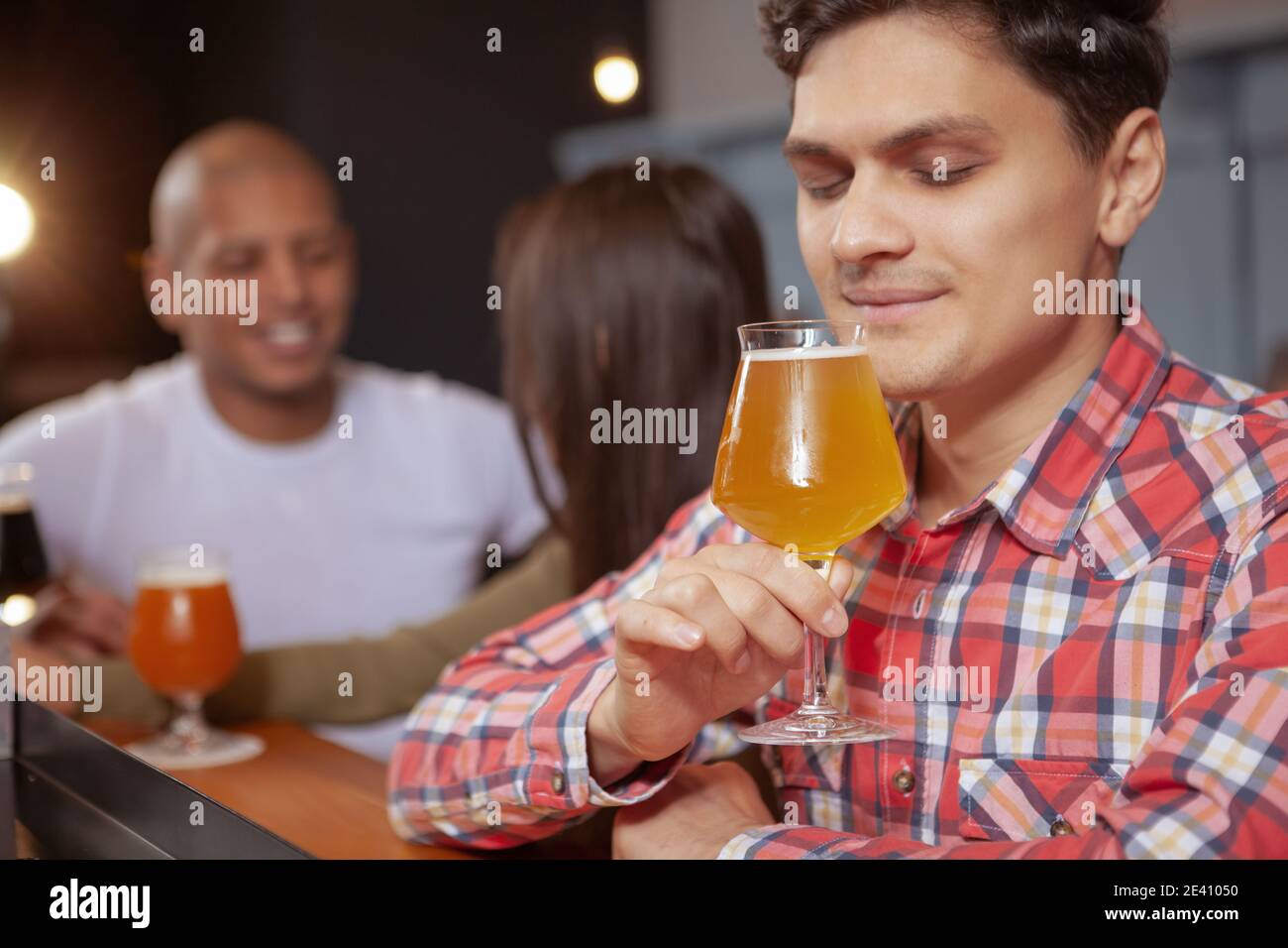 Diverse group enjoying a beer hi-res stock photography and images - Alamy