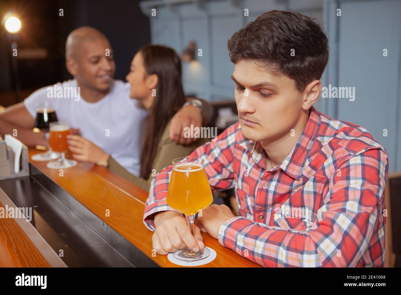 Person alone at bar at party hi-res stock photography and images - Alamy