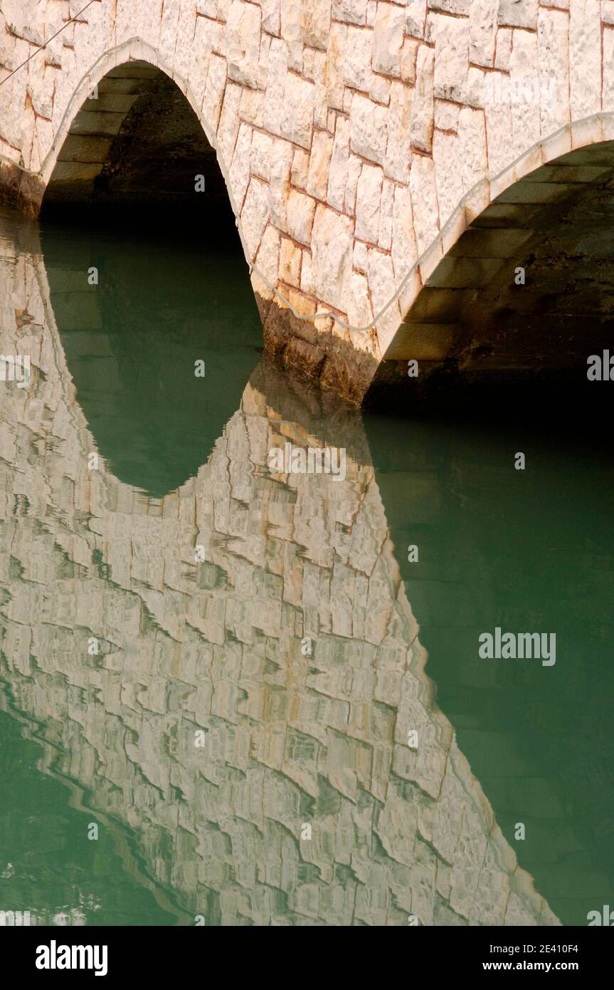 Stone bridge over water, Trogir, Dalmatian Coast, Croatia Stock Photo ...