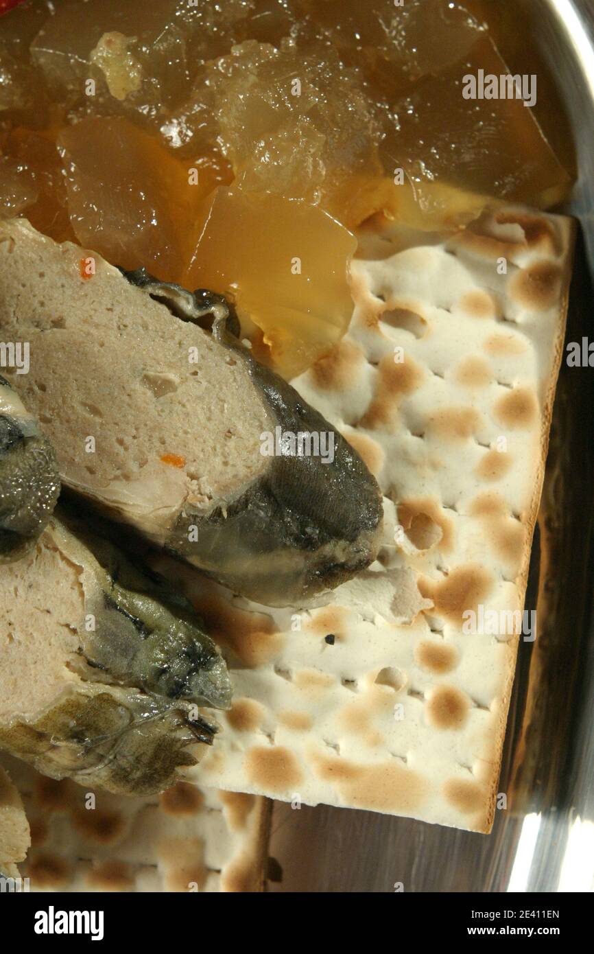 Traditional Jewish cuisine. Gefilte fish with aspic galantine and ...