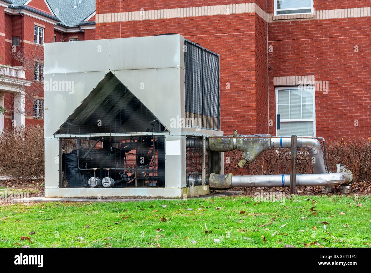 Horizontal close-up shot of a large exterior commercial HVAC unit for a ...