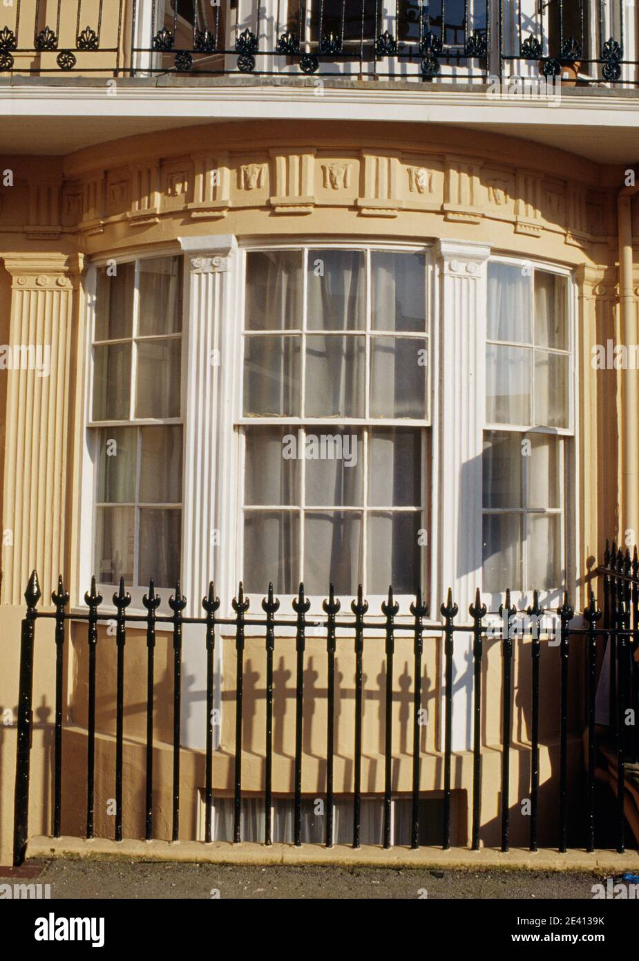 Pair of houses regency style, c.1810, bow window on all storeys ...