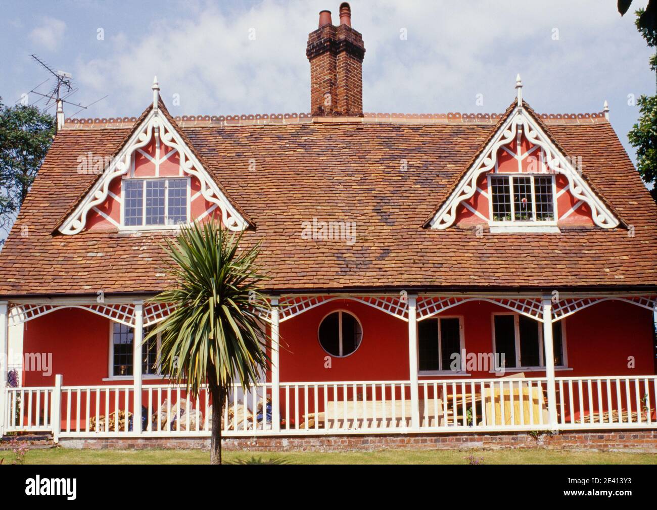 Picturesque cottage with ornamental bargeboards on dormer windows ...
