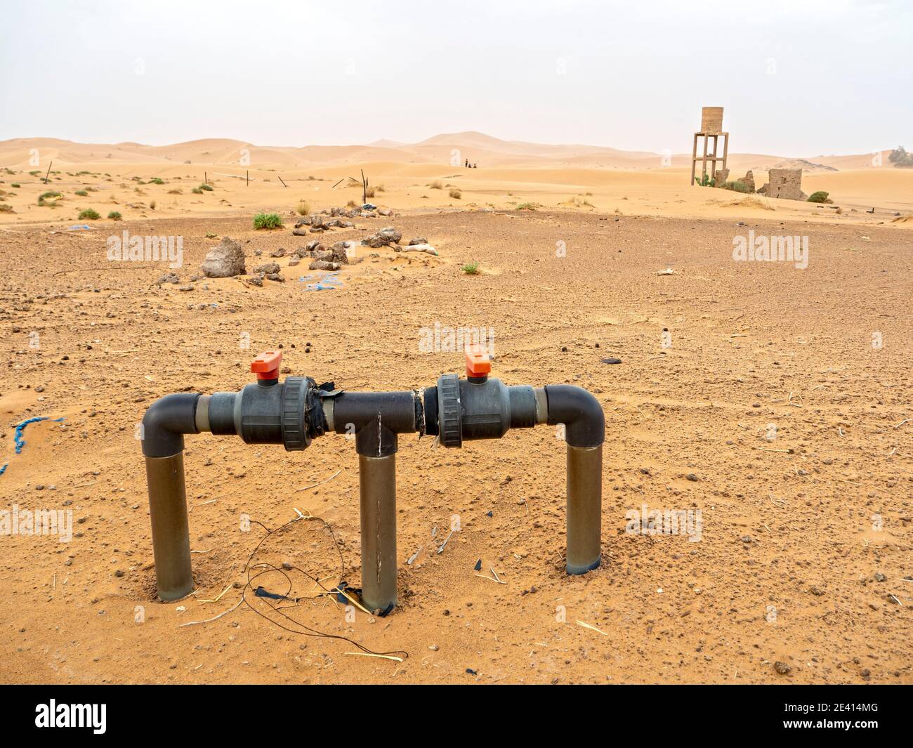 Water distribution installation with a water tank in the background in ...
