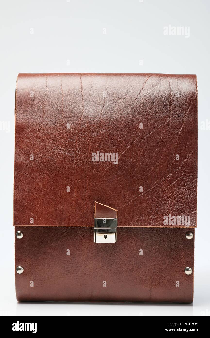 Brown leather document bag with buckle front view isolated Stock Photo ...
