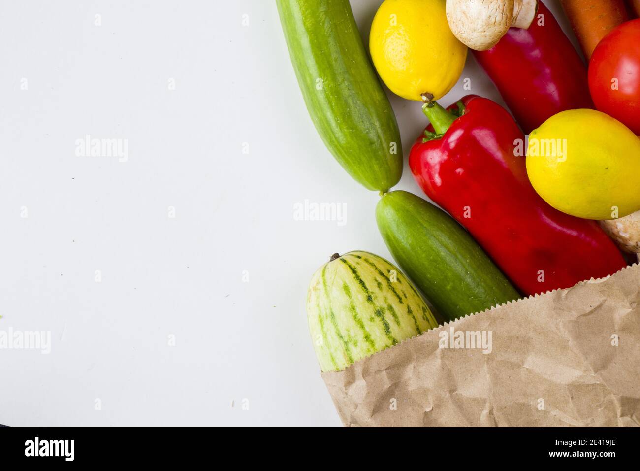 Closeup shot of colorful and organic vegetable mix taken out of the bag ...