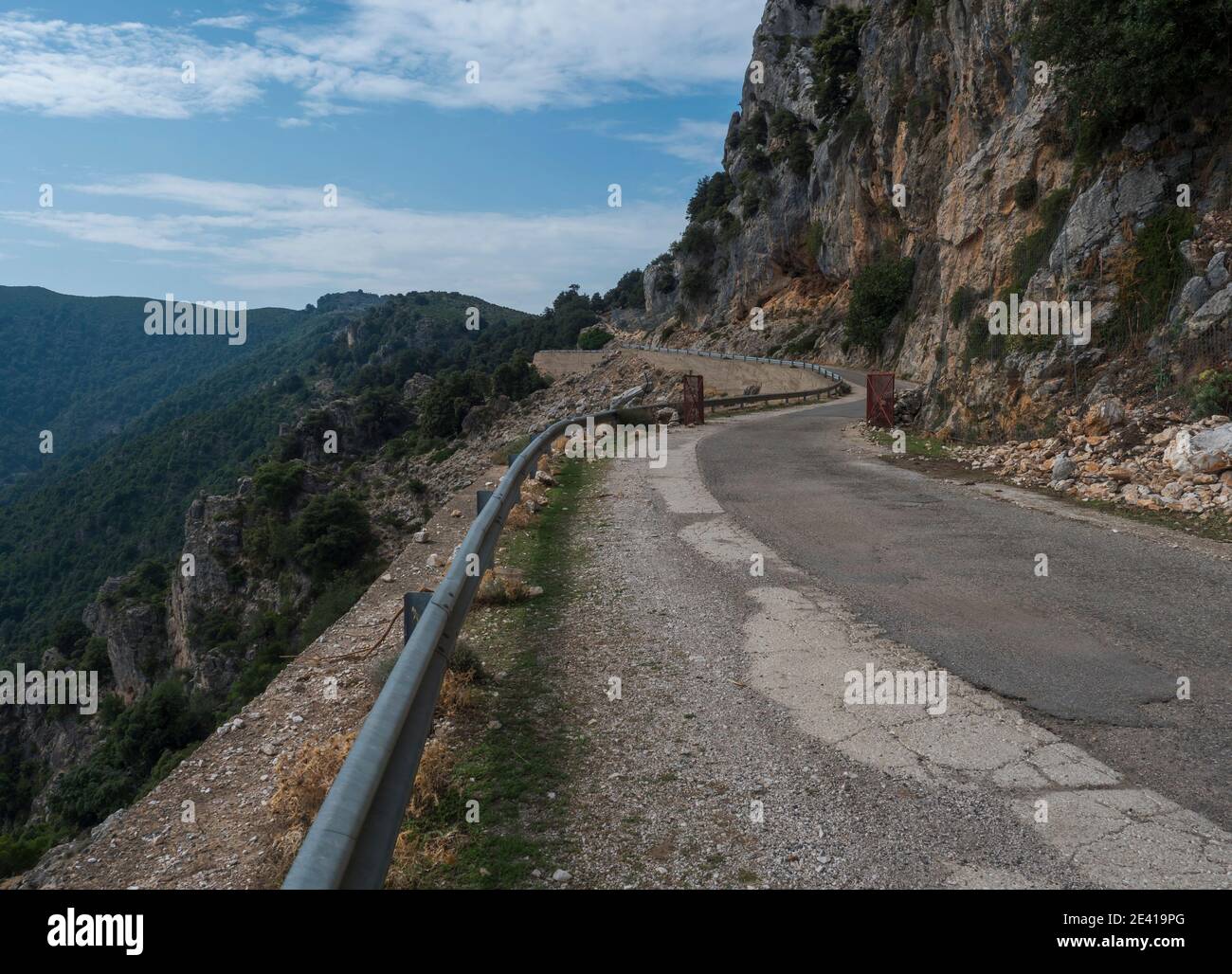 Narrow dangerous asphalt road at Genna Croce pass. at Supramonte ...