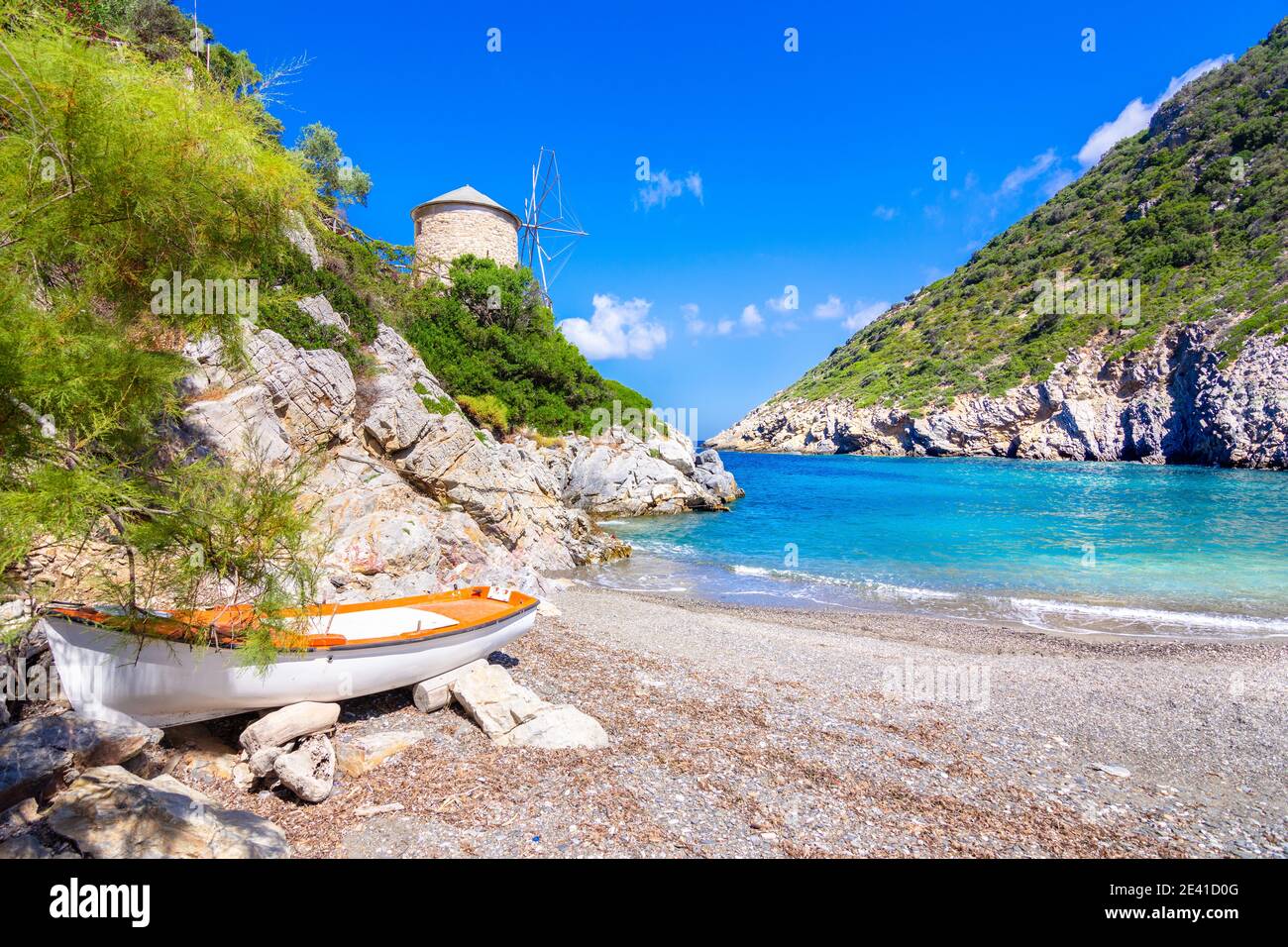 Gialia beach with old windmill in Alonnisos island, Greece Stock Photo ...