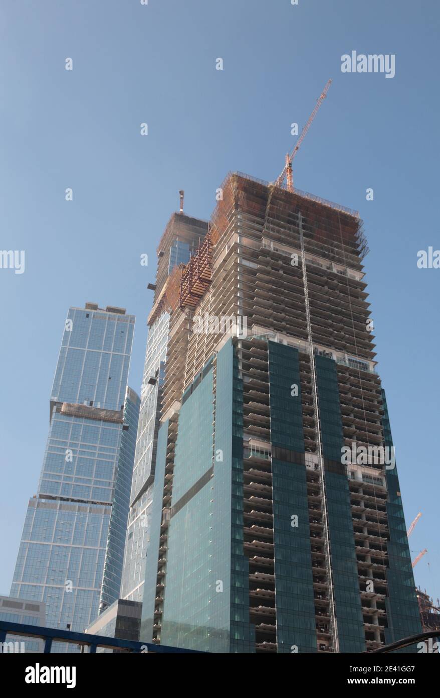 skyscraper develop on sky background at day Stock Photo - Alamy