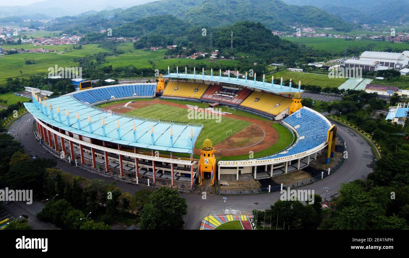 Aerial view of football stadium in Bandung City, Indonesia. Sunset ...