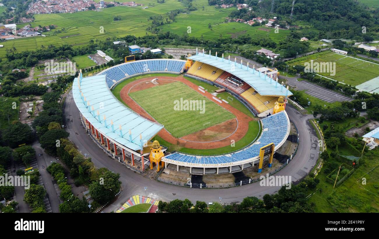Aerial view of football stadium in Bandung City, Indonesia. Sunset ...