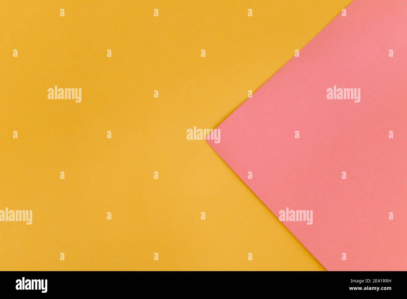 Abstract two tone pink and yellow color background with paper texture ...