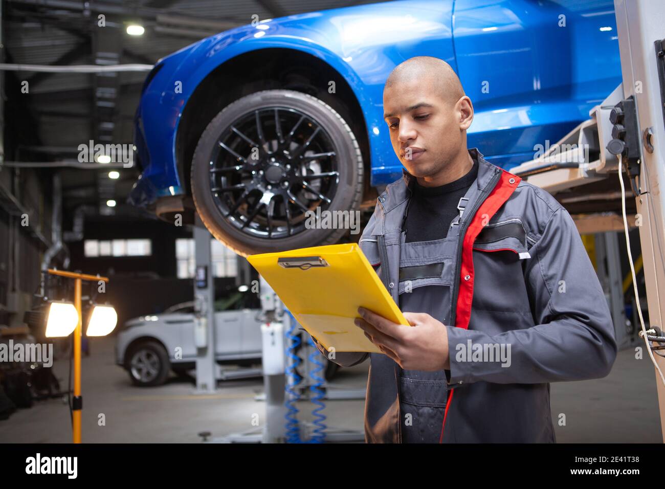 African Man Working On Car Engine High Resolution Stock Photography and ...