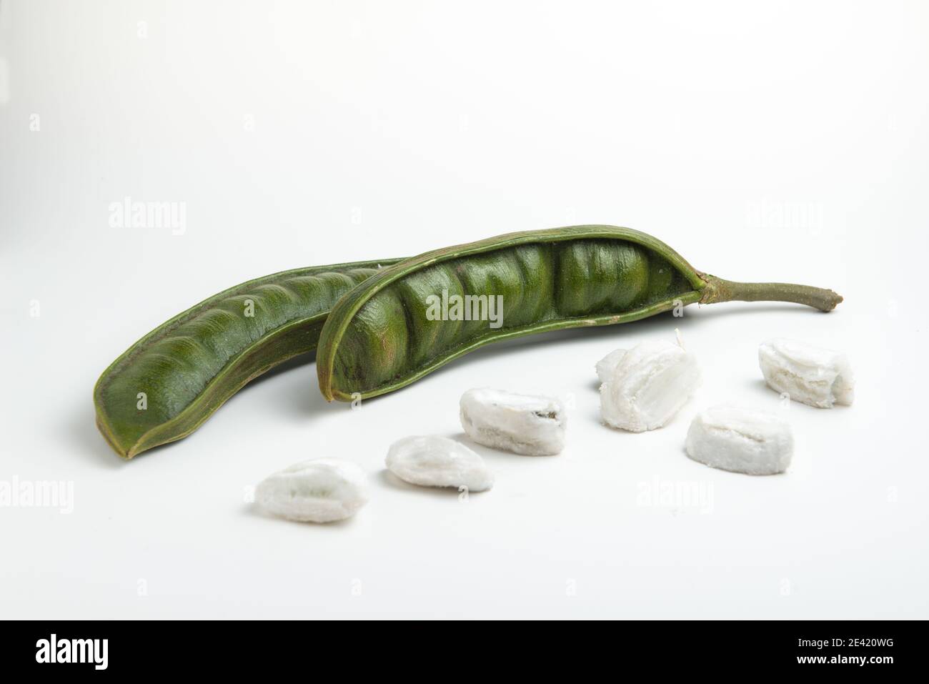 Isolated closeup of guaba pods and seeds on white background Stock ...