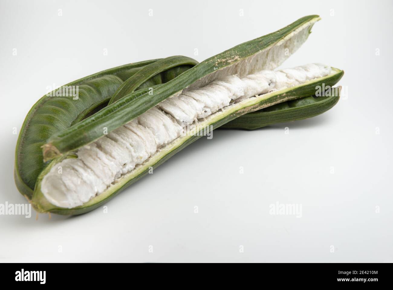 Isolated closeup of guaba pods and seeds on white background Stock ...