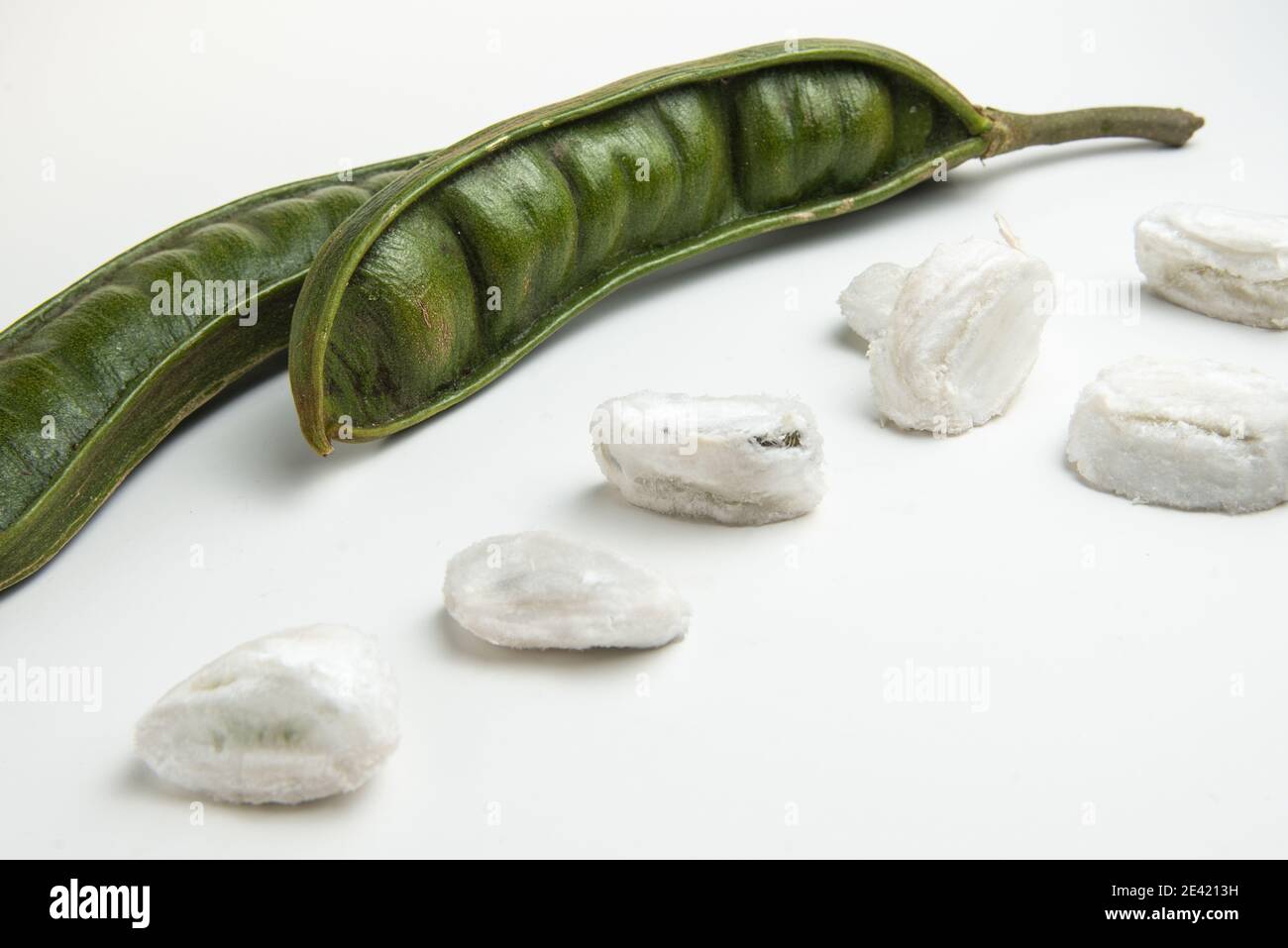 Isolated closeup of guaba pods and seeds on white background Stock ...
