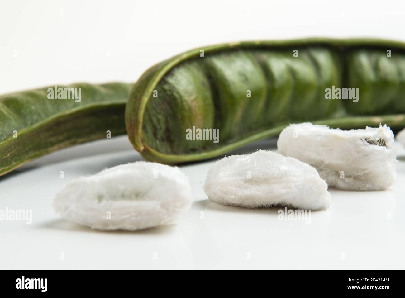 Isolated closeup of guaba pods and seeds on white background Stock ...
