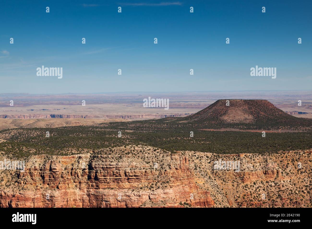 A large butte of land called Cedar Mountain rising up past the level ...