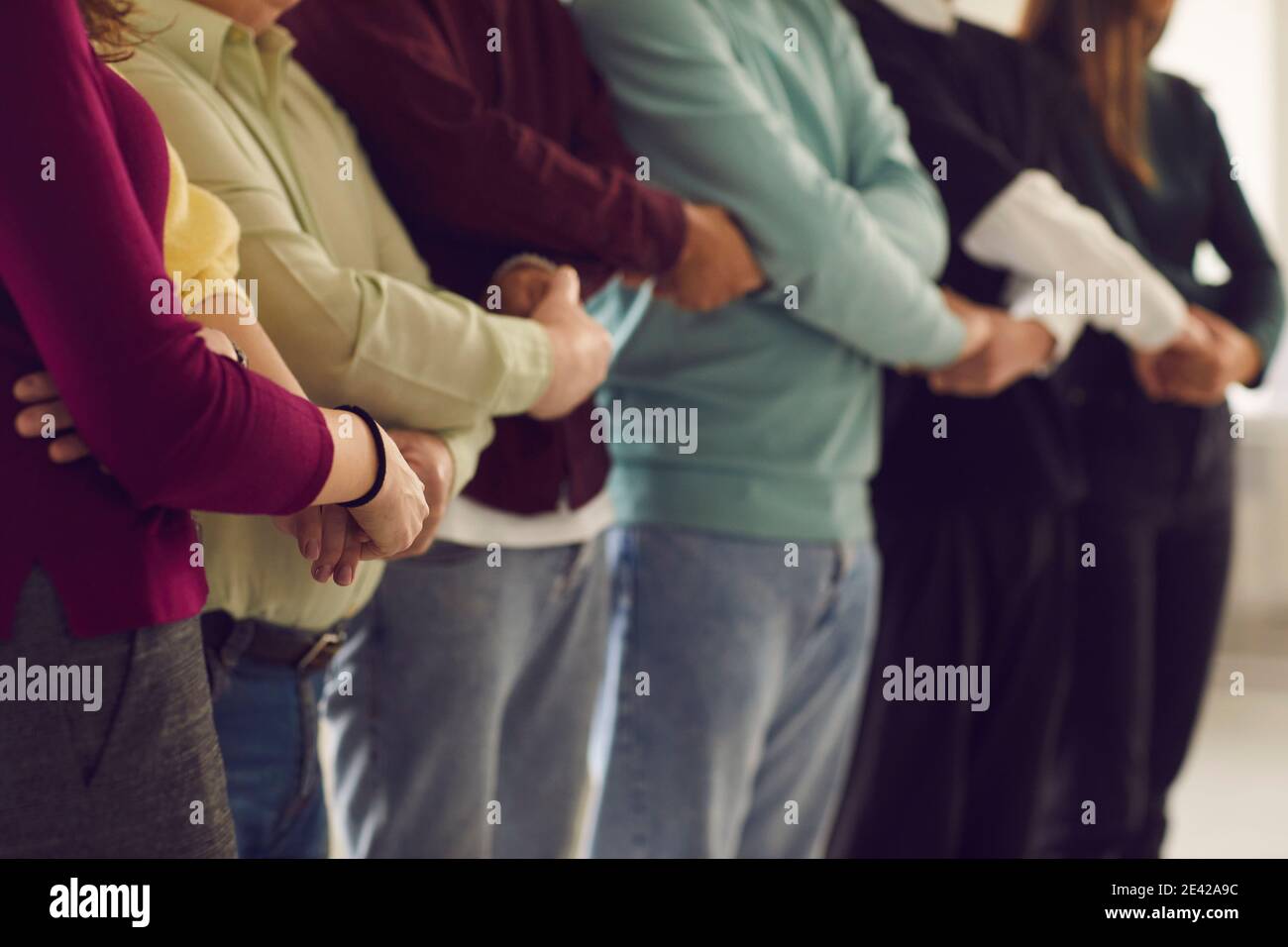Group of people standing together hi-res stock photography and images ...