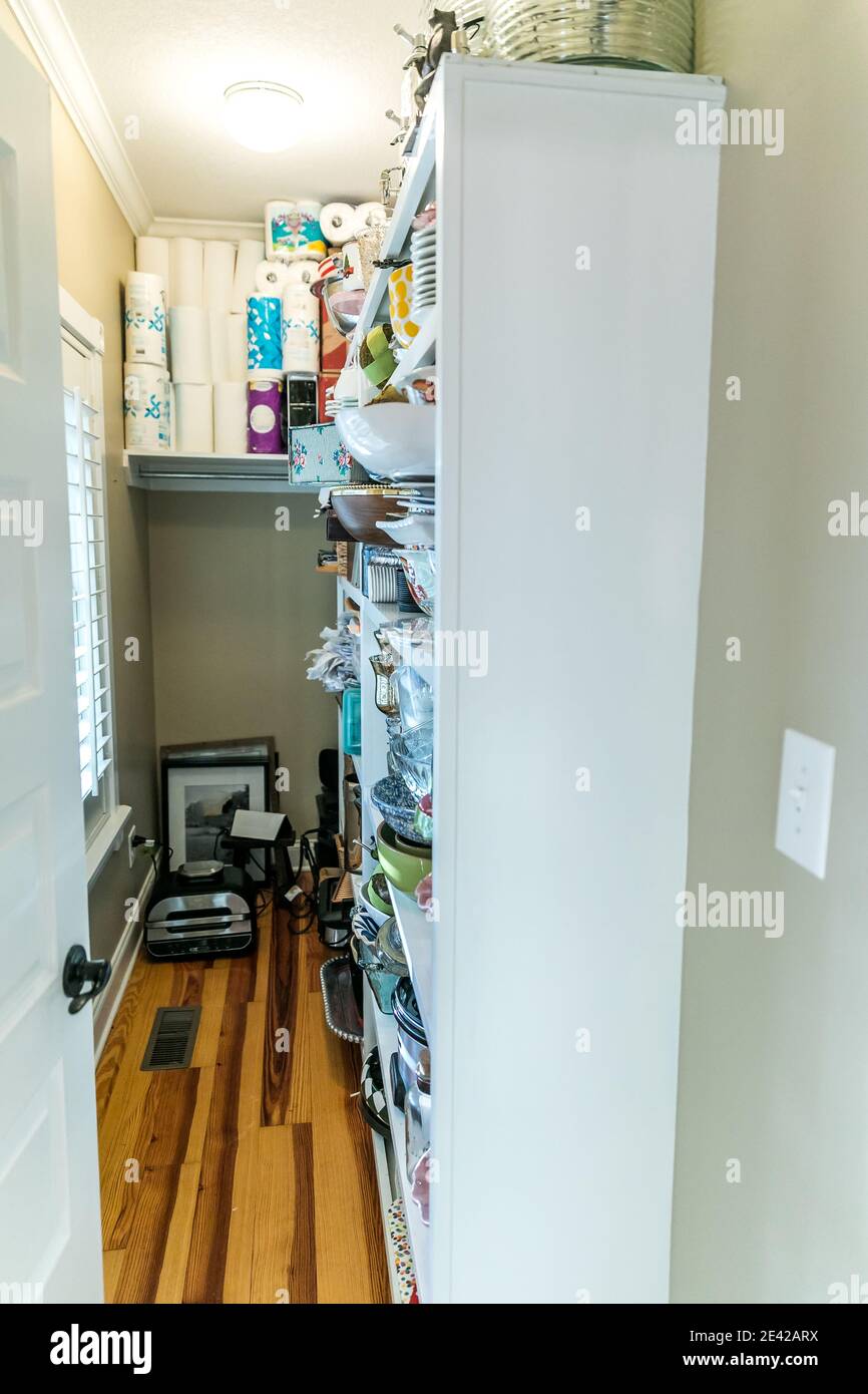 Long and narrow pantry and utility closet for storage Stock Photo - Alamy