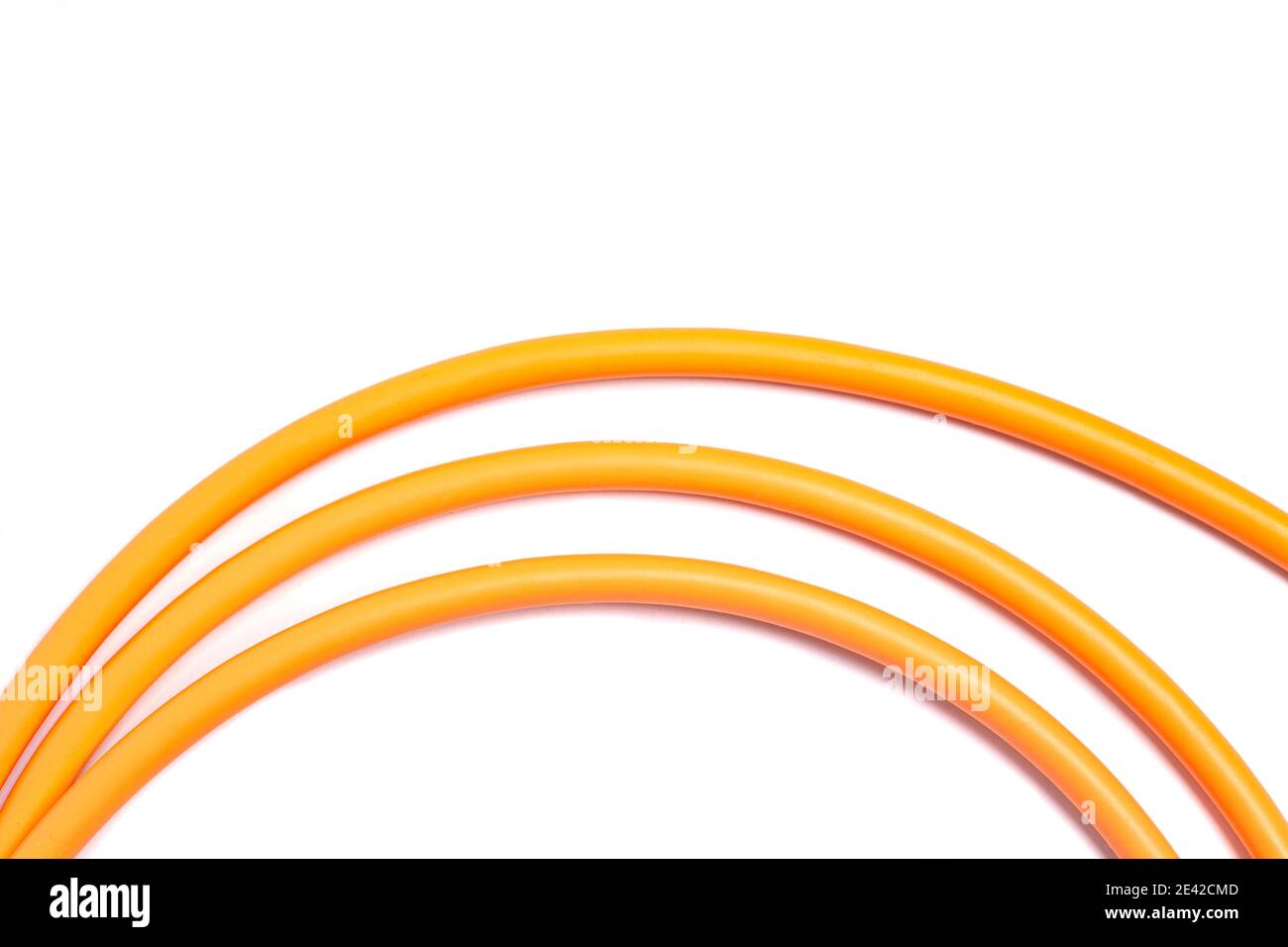 Orange USB rolled cable isolated on white background Stock Photo - Alamy