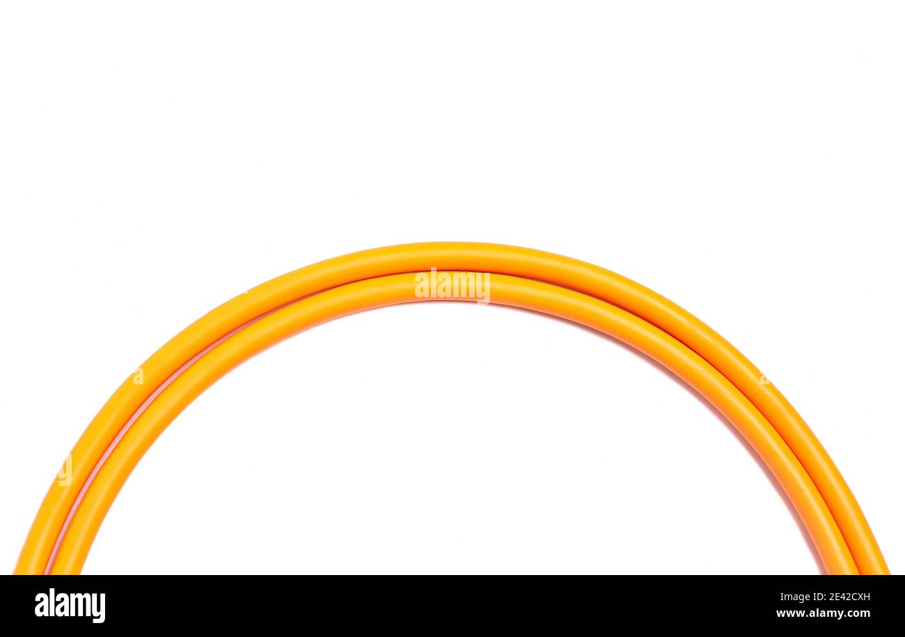 Orange USB rolled cable isolated on white background Stock Photo - Alamy
