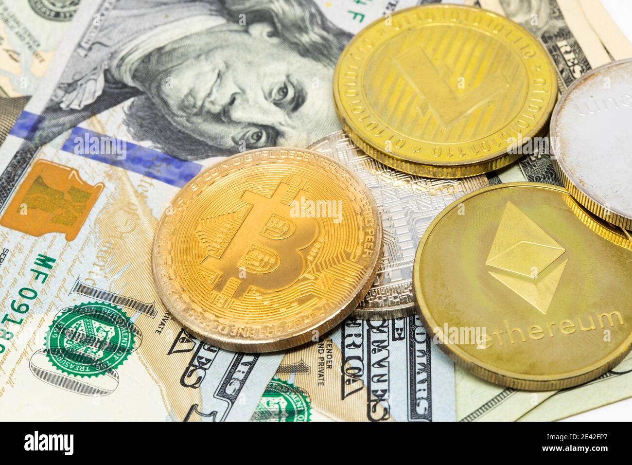 Bitcoin crypto currency on dollar notes close up new currency symbol ...