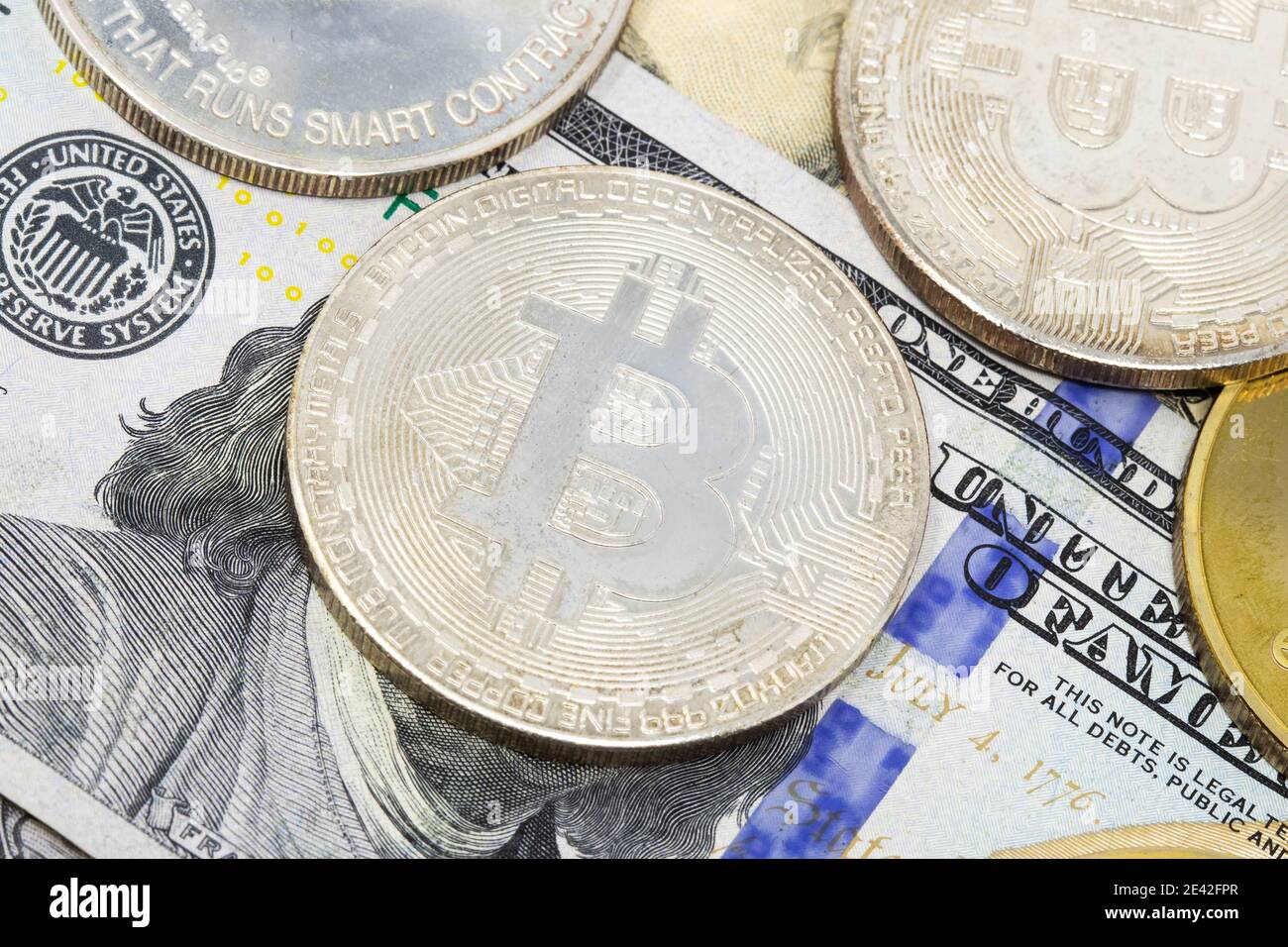 Bitcoin crypto currency on dollar notes close up new currency symbol ...