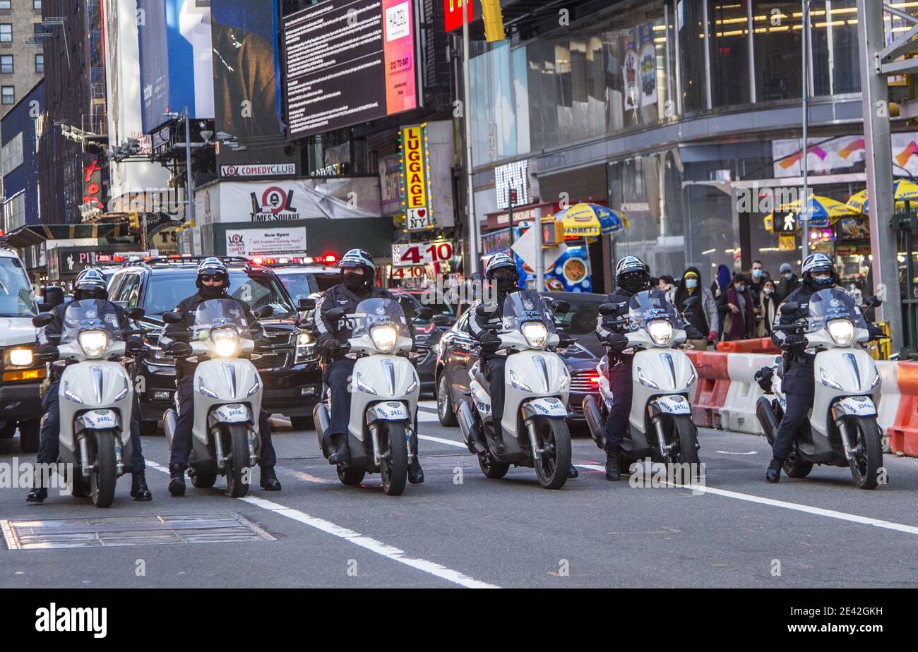 NYPD officers patrol along 7th Avenue in midtown Manhattan after the ...