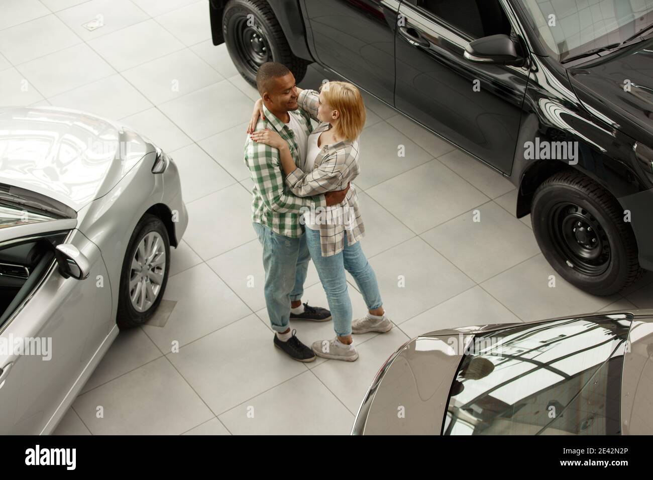 Happy african woman driving a new car hi-res stock photography and ...