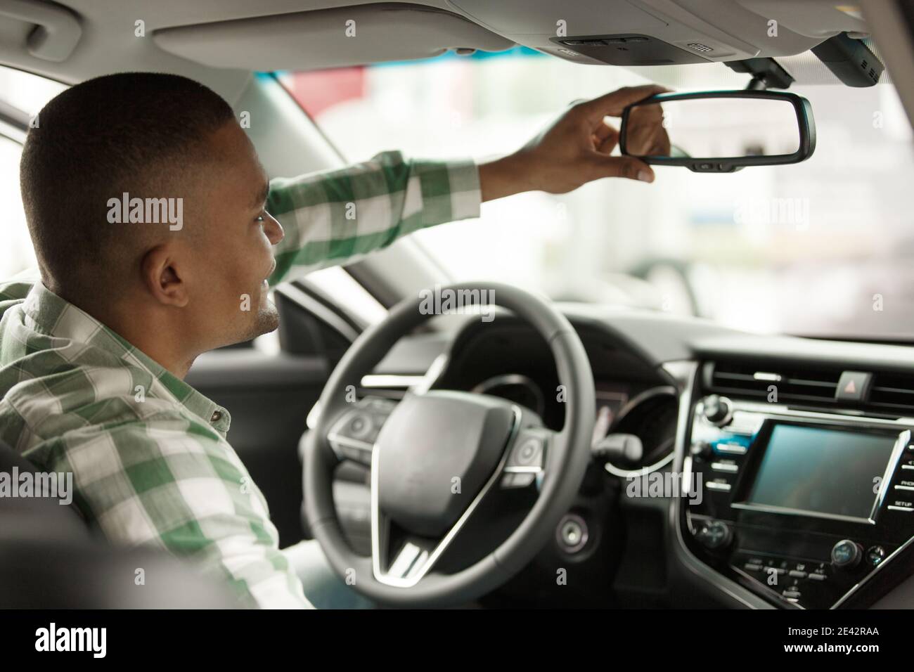 Adjusting the rear view mirror of a car hi-res stock photography and ...