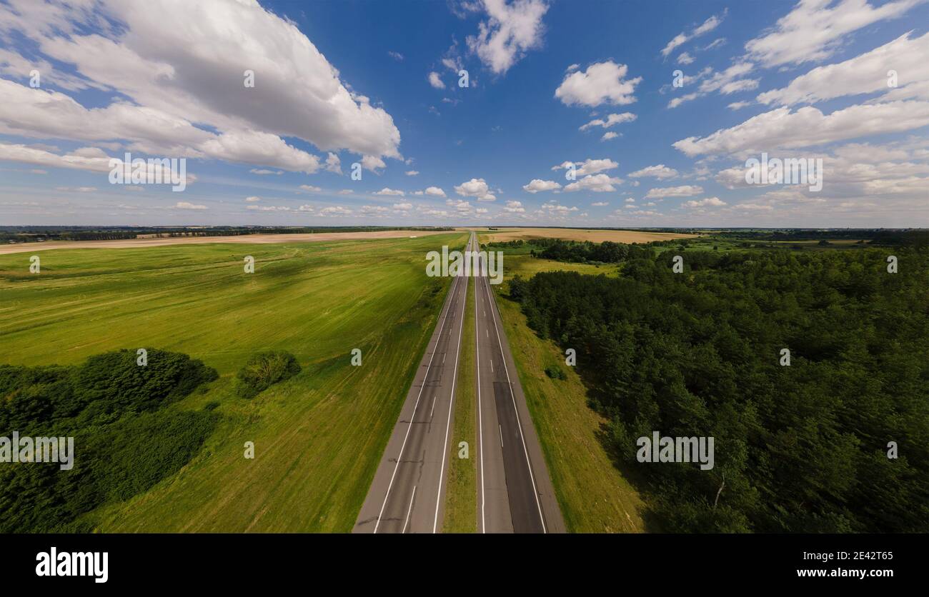 Photo from a flying drone, highway road on a sunny day in summer Stock ...