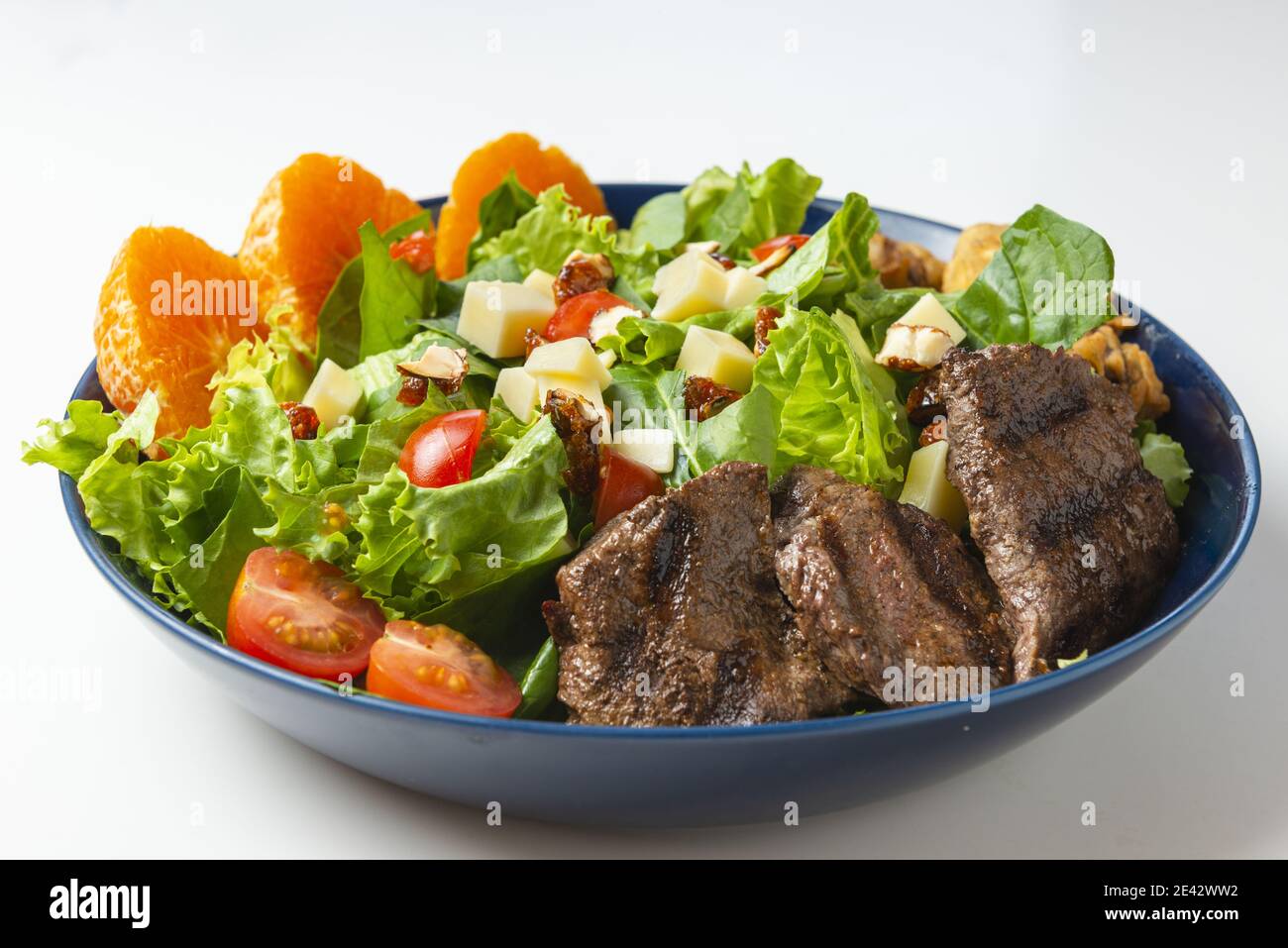 Isolated shot of delicious meat salad with roasted beef and vegetables ...