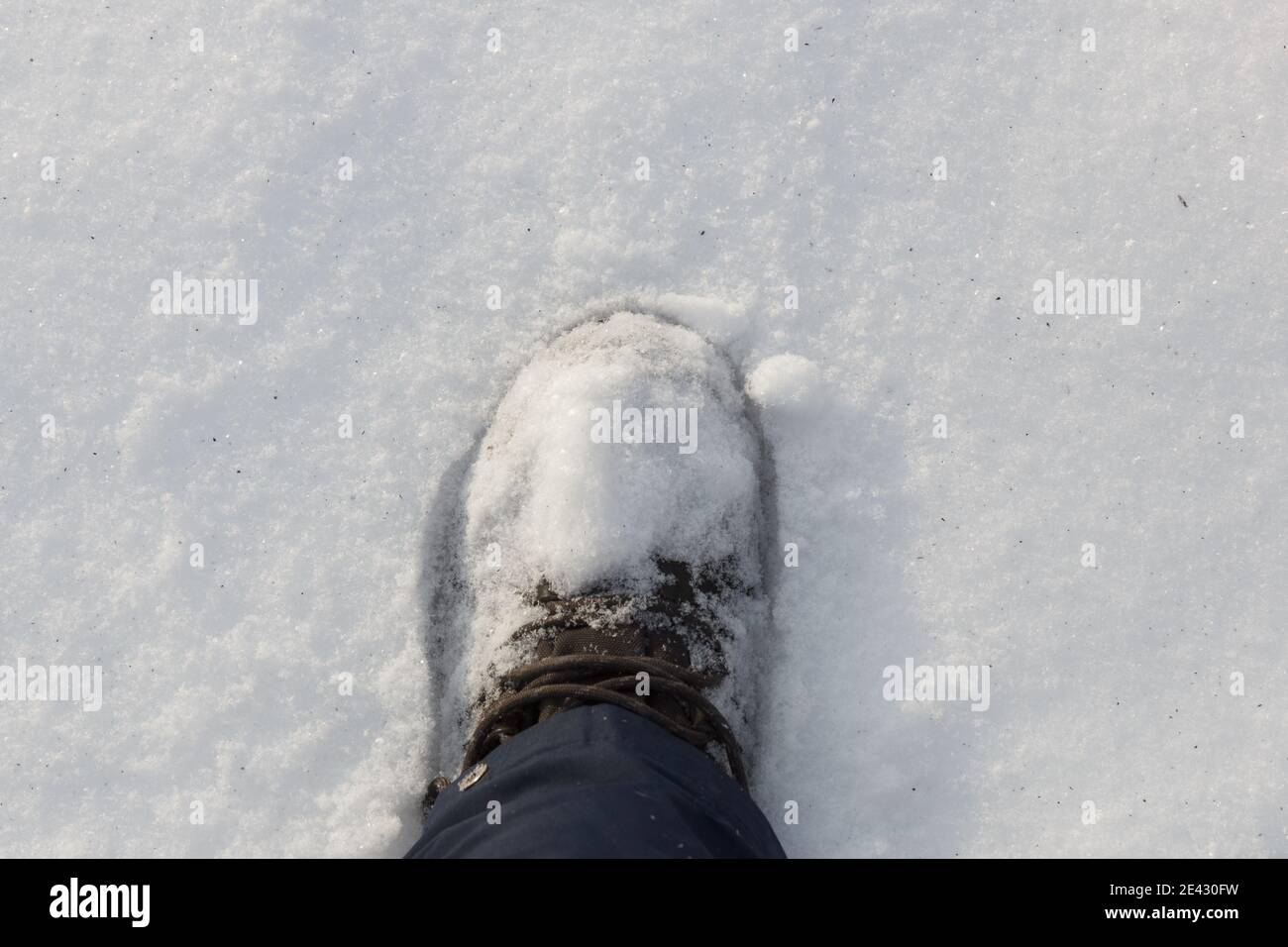 Boots in the snow hi-res stock photography and images - Alamy