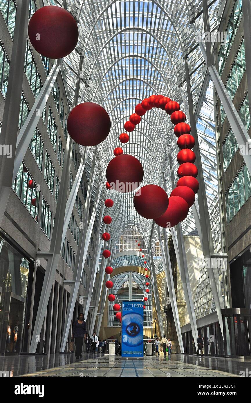 A group of red balls is installed on the atrium of Brookfield Place ...