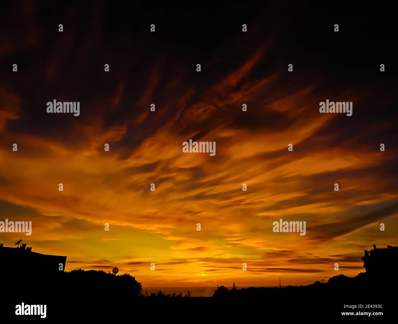 Dark sunset sky over a field Stock Photo - Alamy