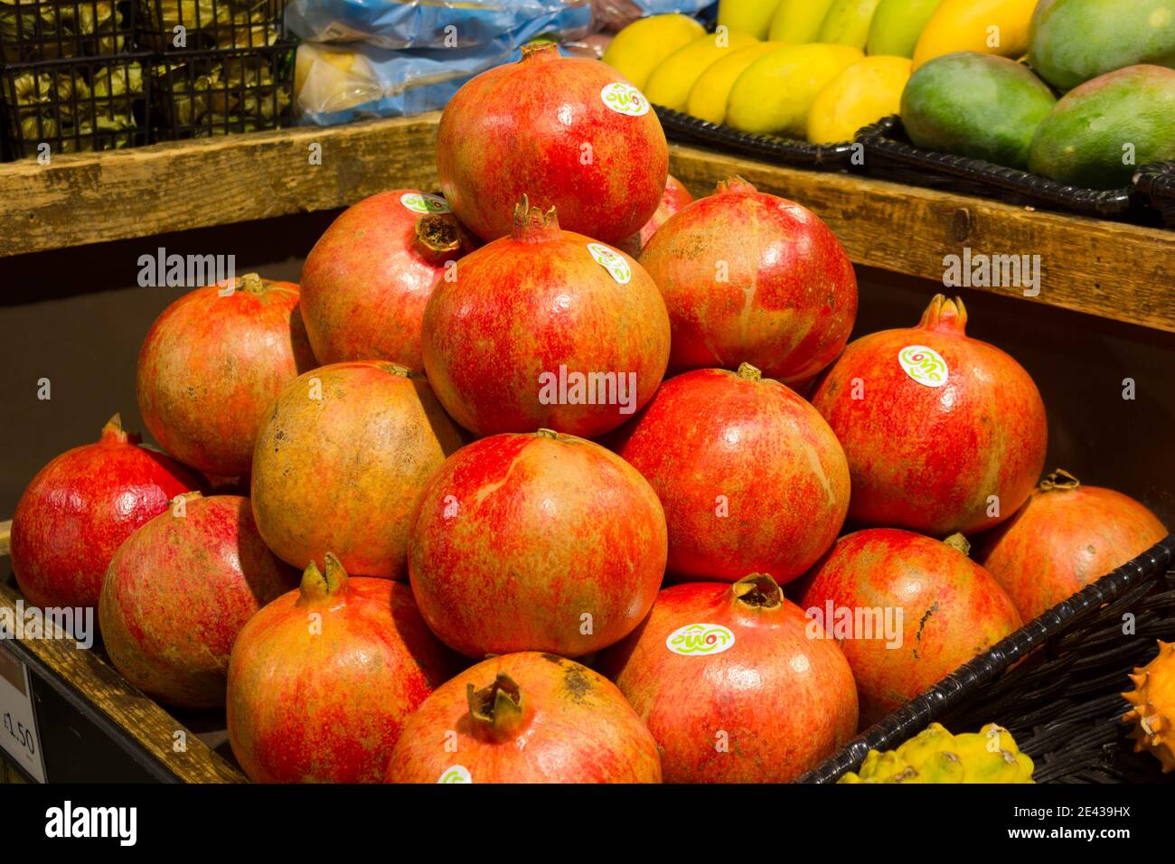 Pomegranate arranged in pyramid shape Stock Photo - Alamy