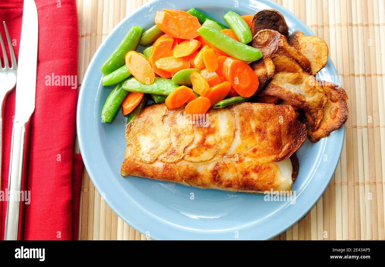 Potato wrapped halibut fish fillets hi-res stock photography and images ...